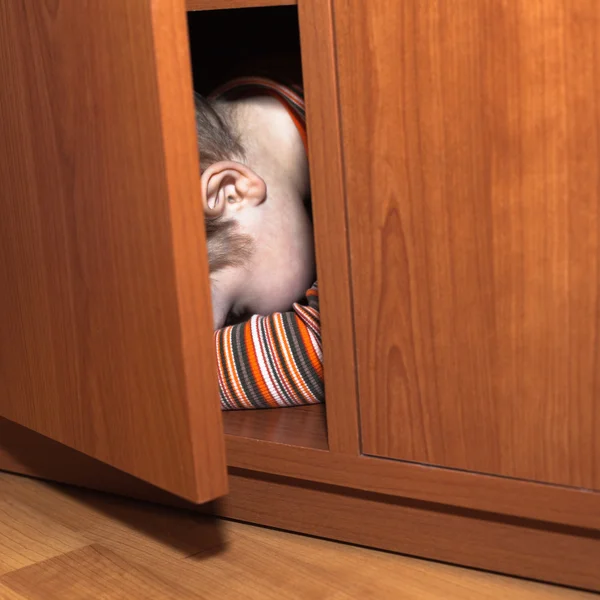 Scared child hiding Stock Photo by ©JanMika 50728403