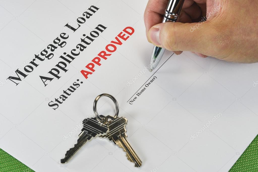 Hand Signing An Approved Real Estate Mortgage Loan Document Stock Photo ...