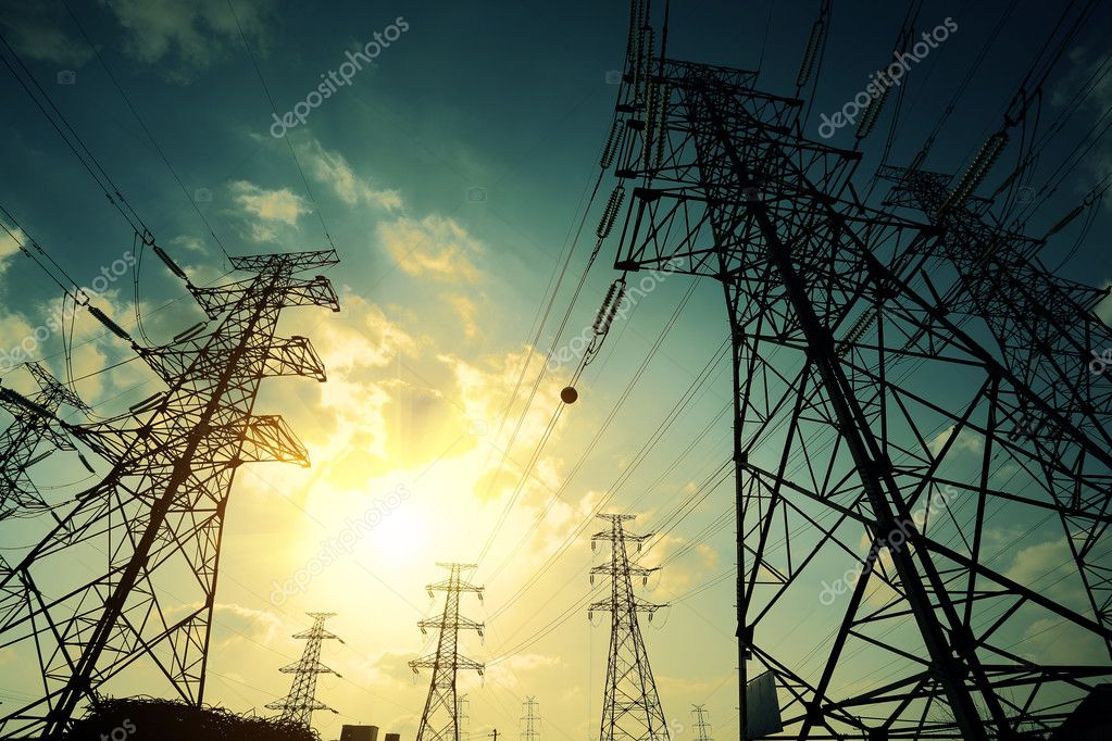 The power transmission towers of sunset sky background — Stock Photo ...