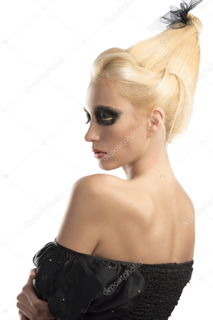 Blonde girl with dark make-up turned back Stock Photo by ©carlodapino ...