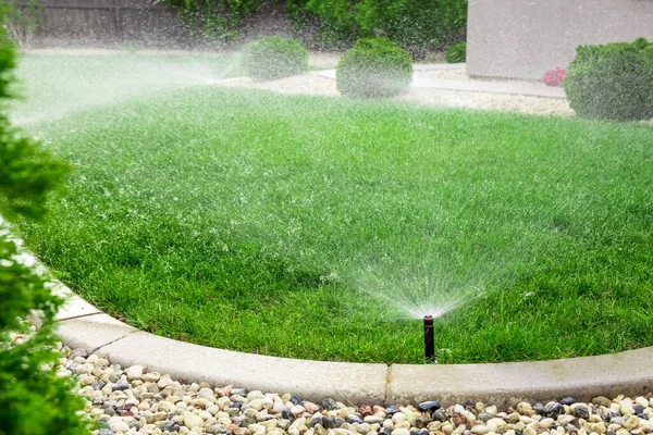 Lawn watering Stock Photos, Royalty Free Lawn watering Images ...