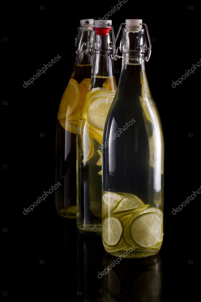 Citrus infusion in bottles Stock Photo by ©wollertz 23547863