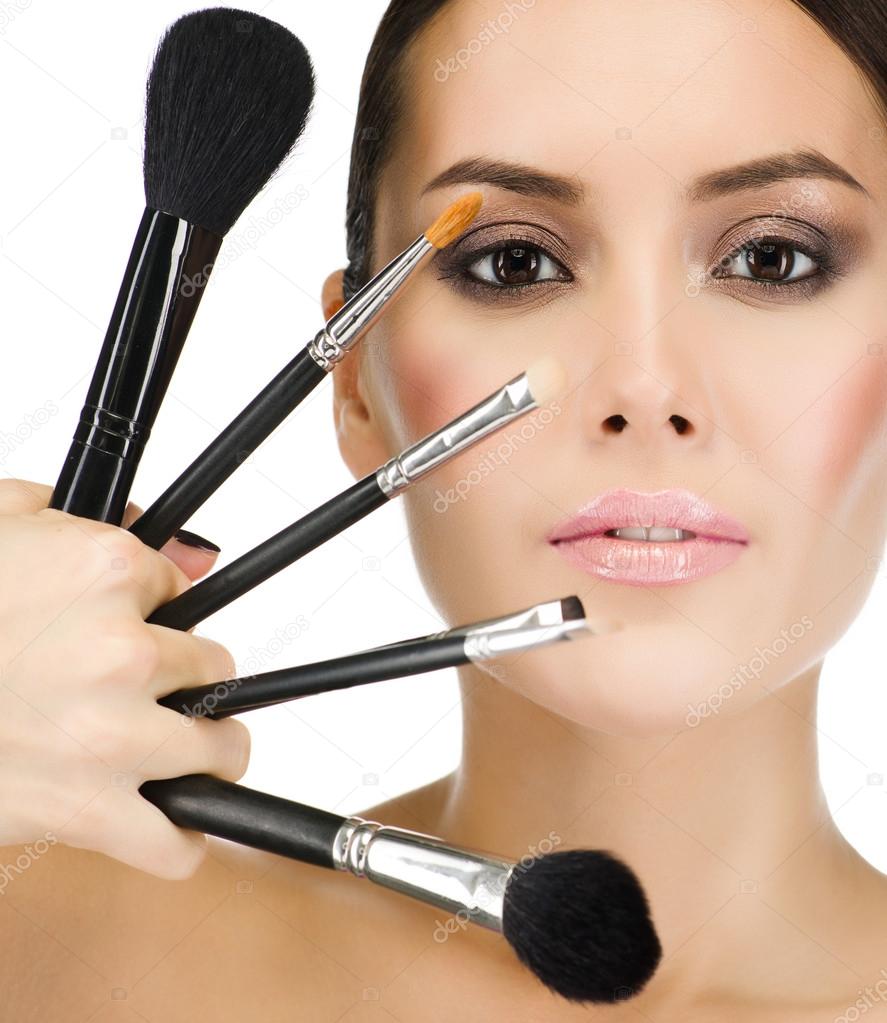 Woman with make up brushes Stock Photo by ©dedukh 39085757