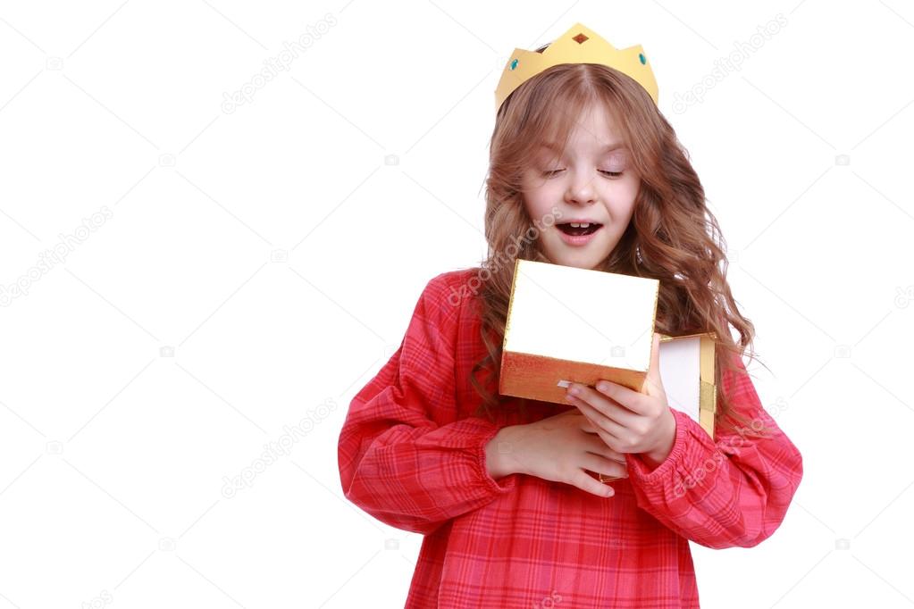 Girl wearing paper crown Stock Photo by ©Mari1Photo 43965029