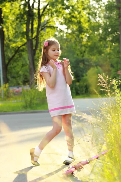 Pretty girl in park ⬇ Stock Photo, Image by © Mari1Photo #49389519