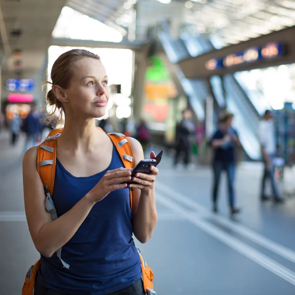 Woman in a train station, sending message Stock Photo by ©lightpoet ...
