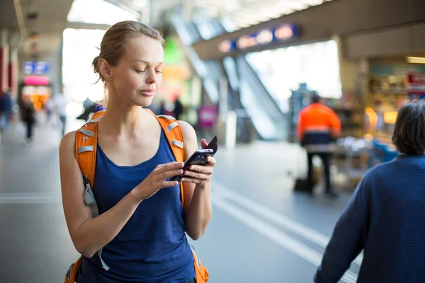 Woman in a train station, sending message Stock Photo by ©lightpoet ...