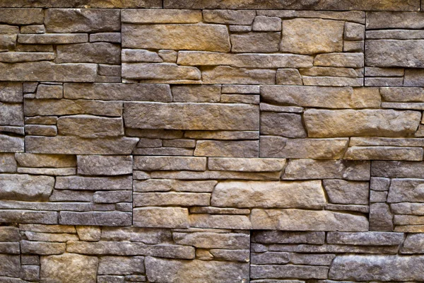 Cladding texture of a stone wall, background of natural stone materials ...