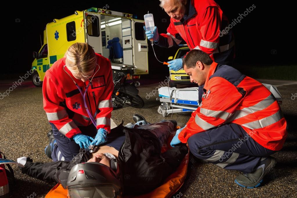 Emergency team helping injured driver Stock Photo by ©CandyBoxImages ...