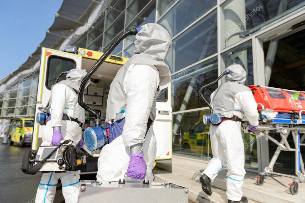 HAZMAT team entering contaminated building — Stock Photo ...