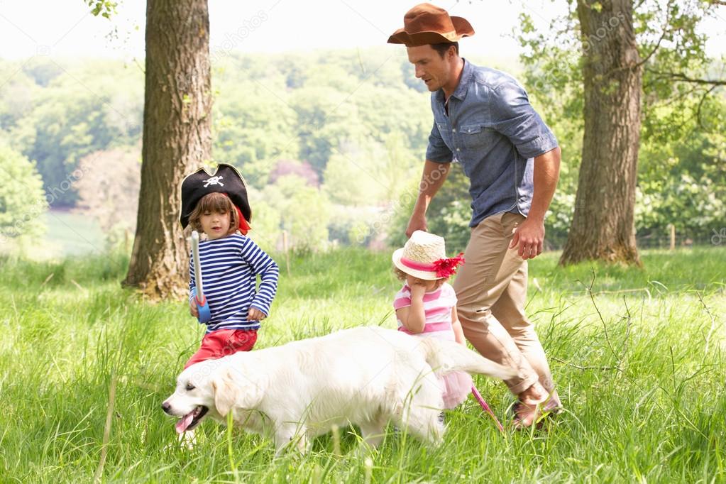 Father Playing Exciting Adventure Game With Children And Dog In — Stock ... Father Playing Exciting Adventure Game With Children And Dog In — Stock ...