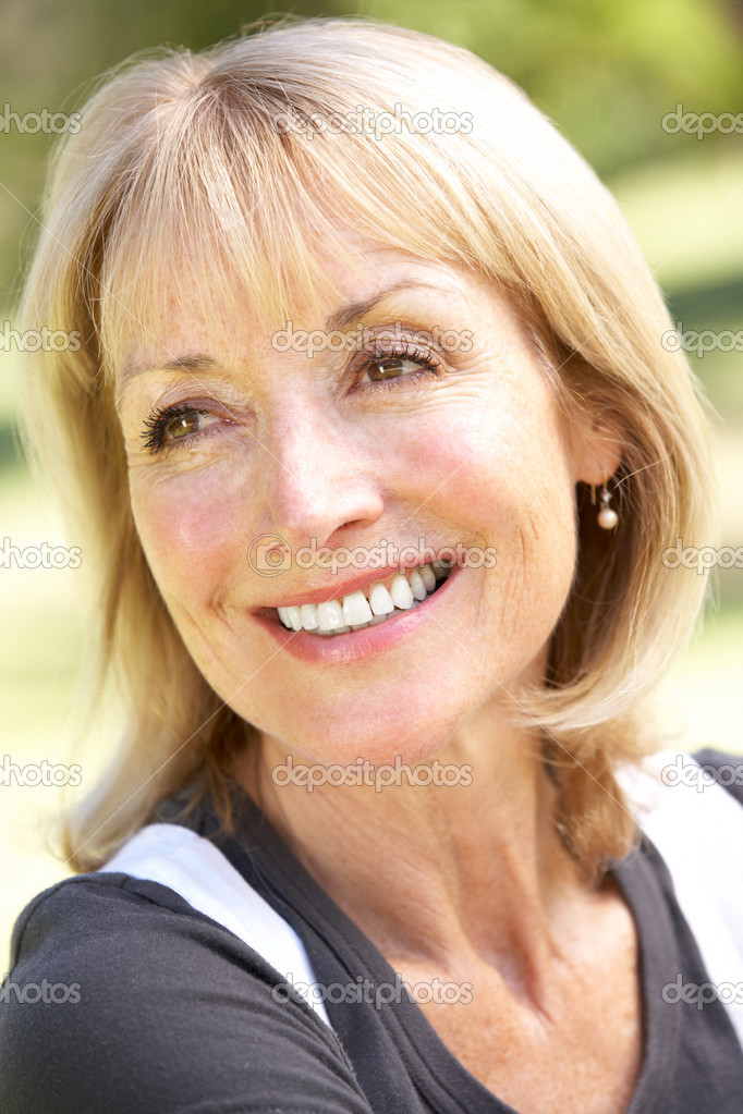 Outdoor Portrait Of Smiling Senior Woman Stock Photo by ©monkeybusiness 24638421