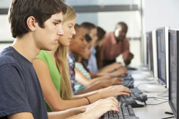 Group Of Students Working At Computers In Classroom - Stock Image ...