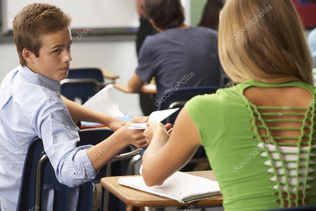 Students Passing Notes In Class Stock Photo by ©monkeybusiness 27554059 Students Passing Notes In Class Stock Photo by ©monkeybusiness 27554059