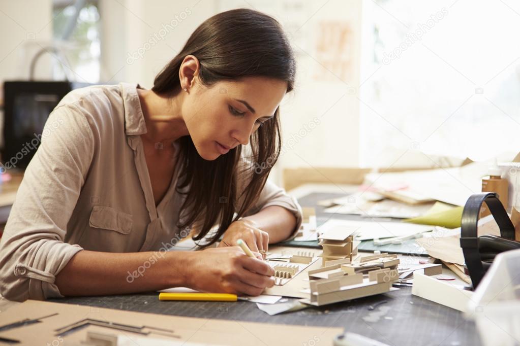 Female Architect Making Model In Office Stock Photo by ©monkeybusiness ...