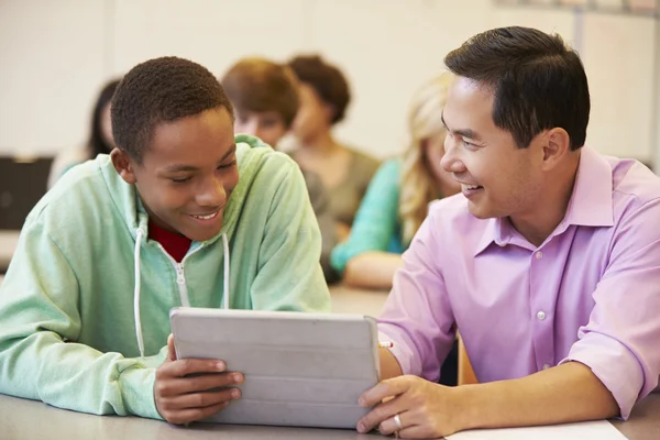 Teacher helping student Stock Photos, Royalty Free Teacher helping ...