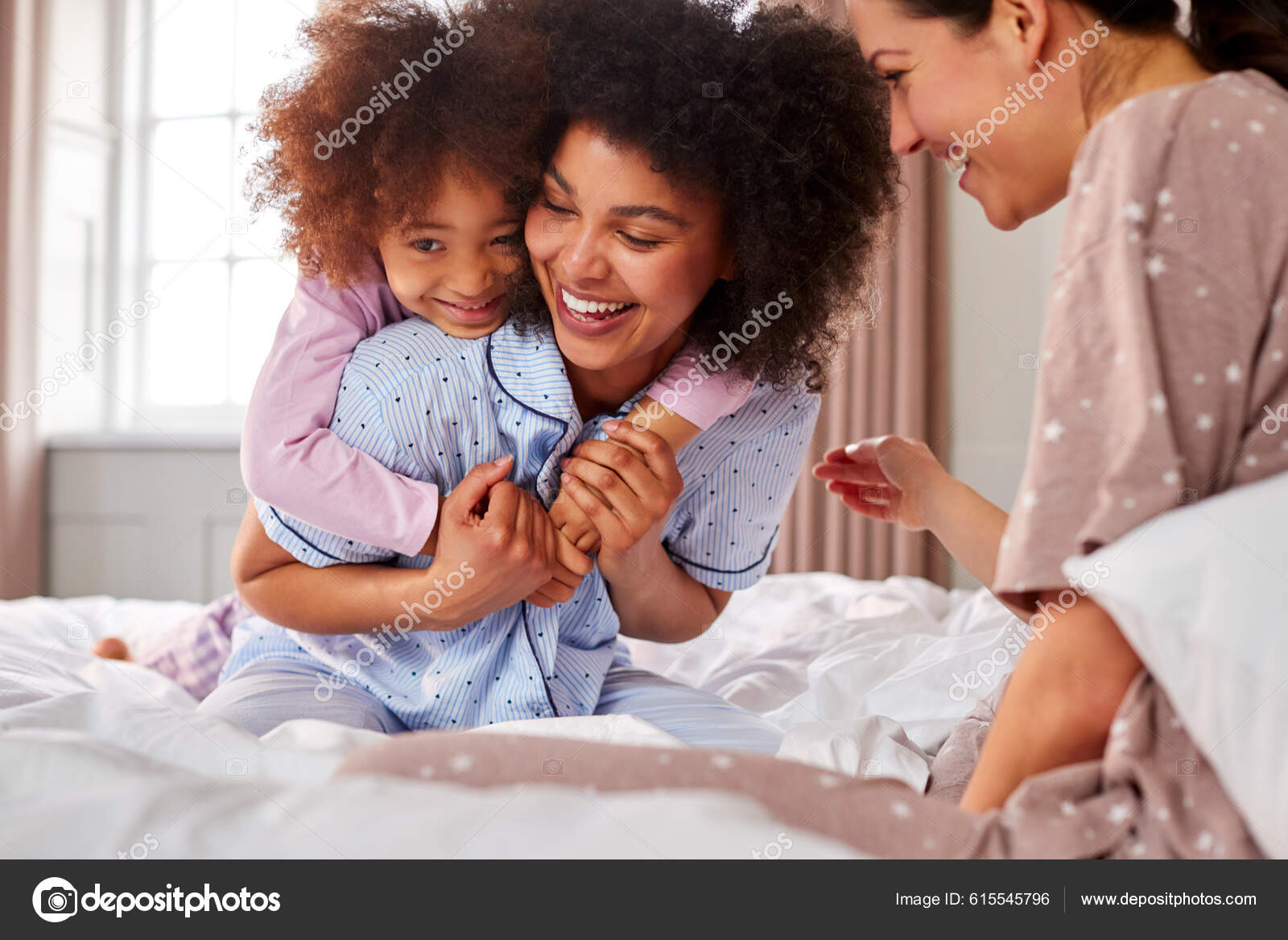 Family Two Mums Wearing Pyjamas Playing Bed Home Daughter — Stock Photo ...