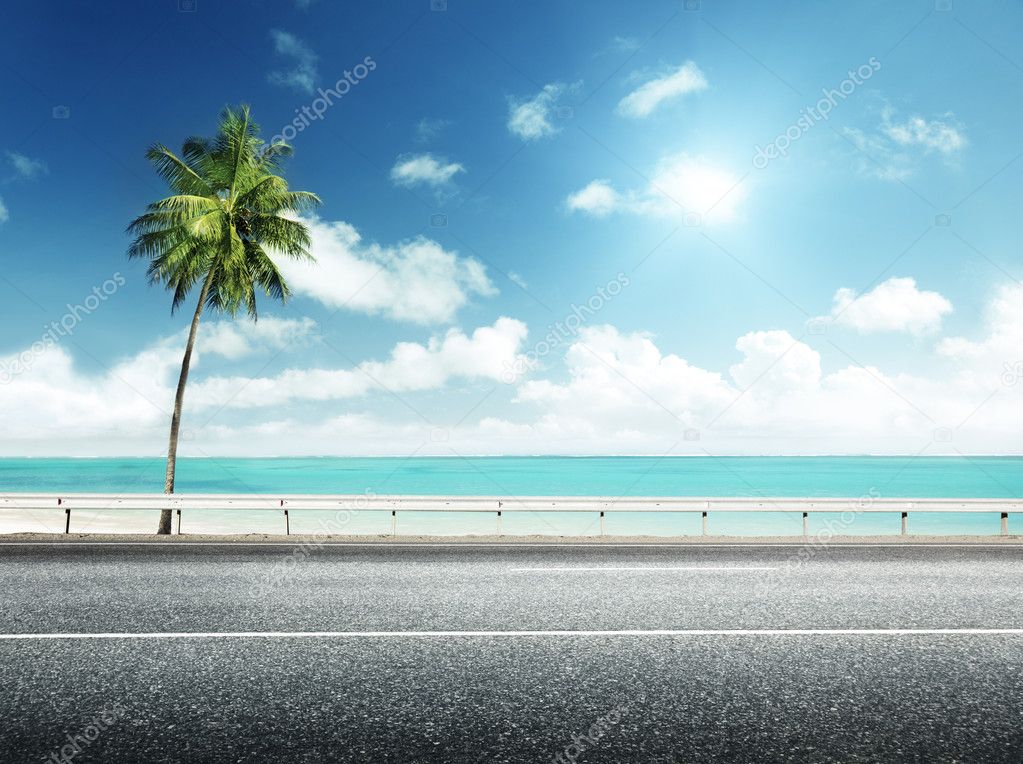 Asphalt road and sea — Stock Photo © Iakov #34652993