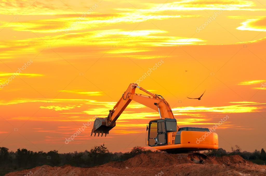 Excavator at Construction Site — Stock Photo © tingyaso #34781677