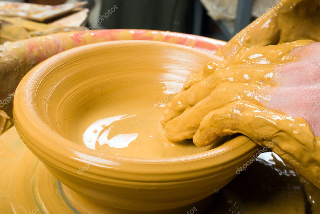 Hands of a potter, creating an earthen jar of white clay Stock Photo by ...