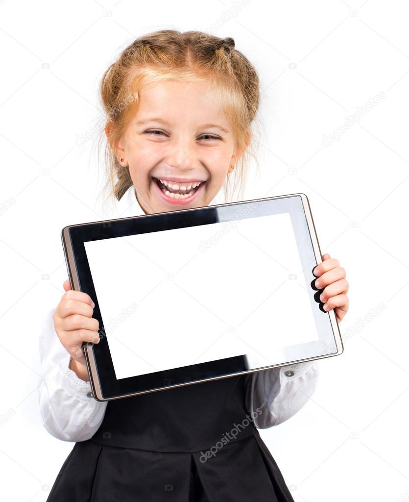 Cute schoolgirl with a pc tablet Stock Photo by ©GekaSkr 29451333