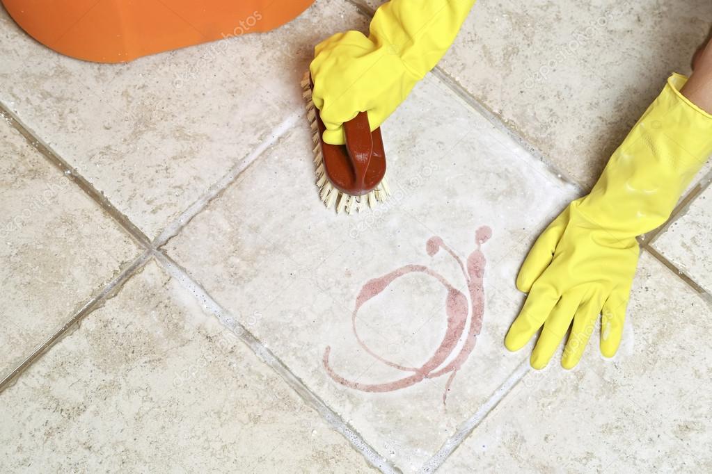 Scrubbing the floor — Stock Photo © costasz #31147449