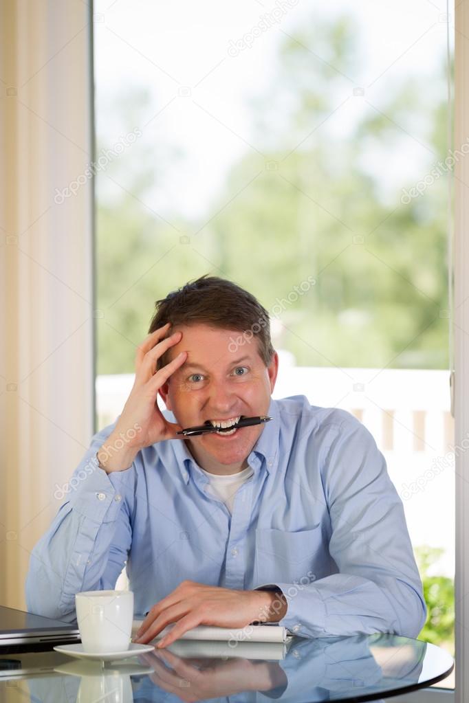 Mature man stressed at work — Stock Photo © tab62 #48510167