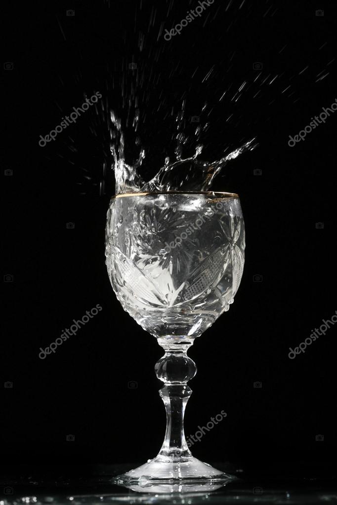 Water splash in glass Stock Photo by ©yellow2j 31486803