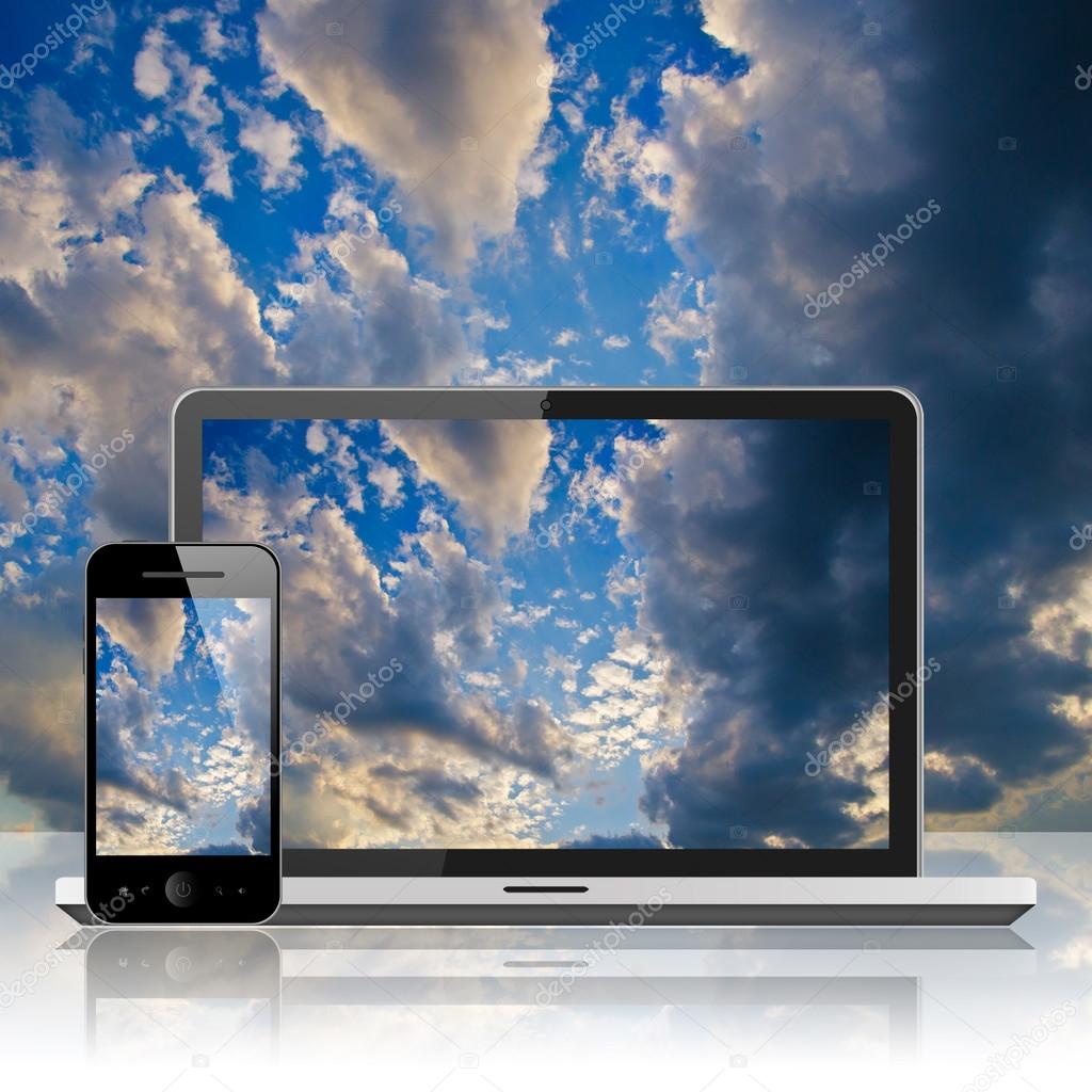 Laptop and mobile phone — Stock Photo © Nik_Merkulov #30274021