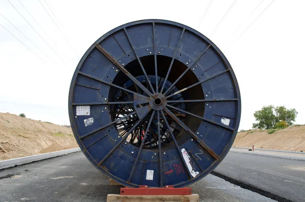 High voltage cable reel roll road construction — Stock Photo © sauletas ...