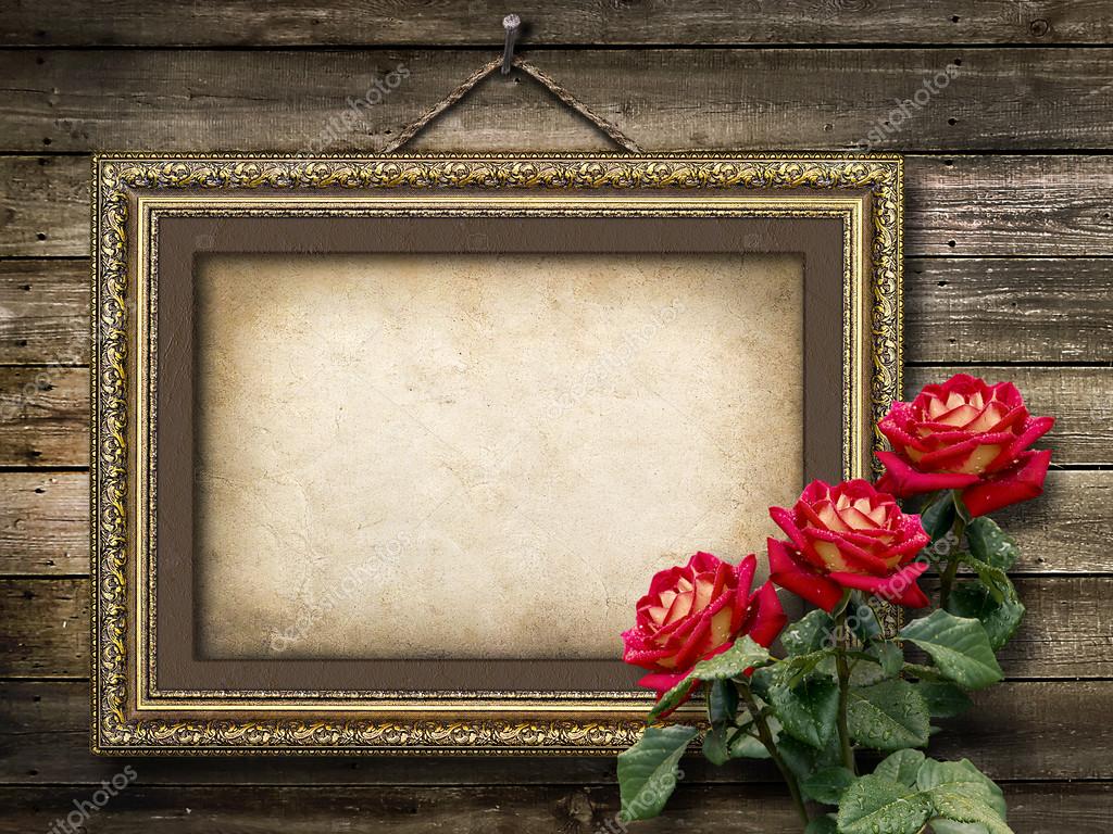 Old vintage frame for photos and a bouquet of red roses — Stock Photo ...