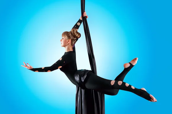 Beautiful dancer on aerial silk, aerial contortion, aerial ribbons ...