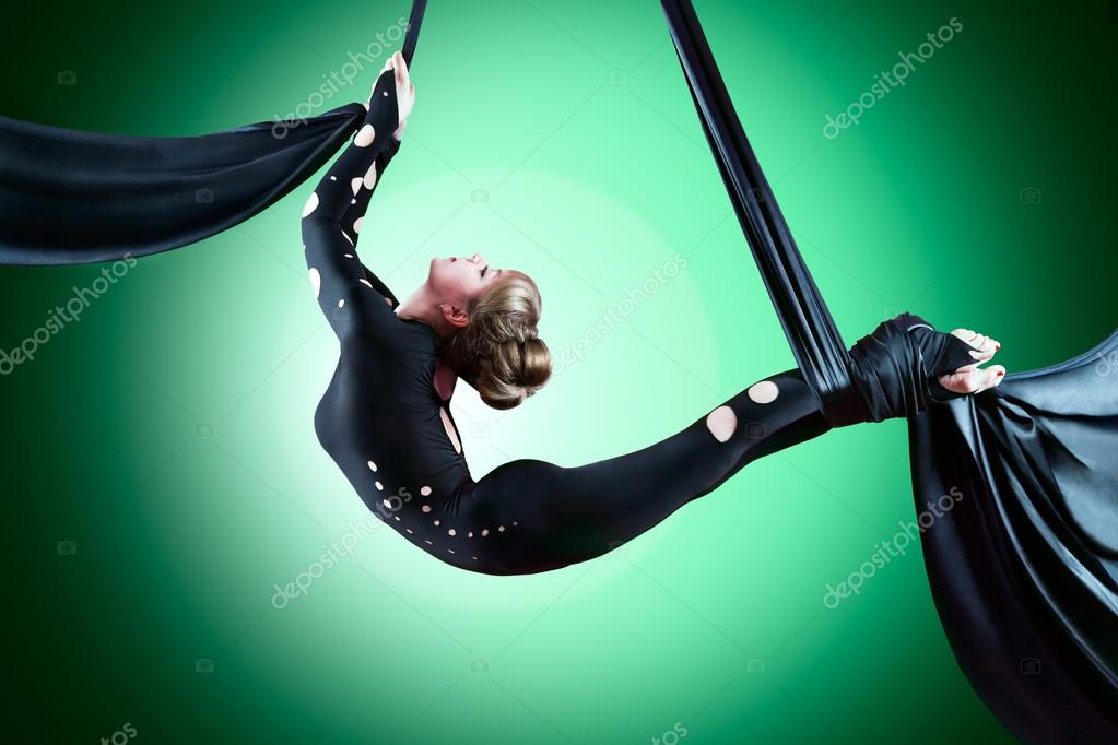 Beautiful dancer on aerial silk, aerial contortion, aerial ribbons ...
