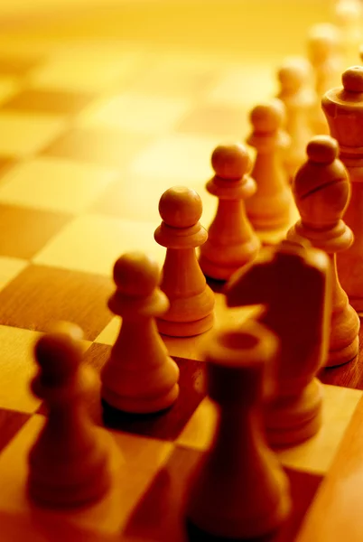 Chess pieces in yellow ambient light - Stock Image - Everypixel