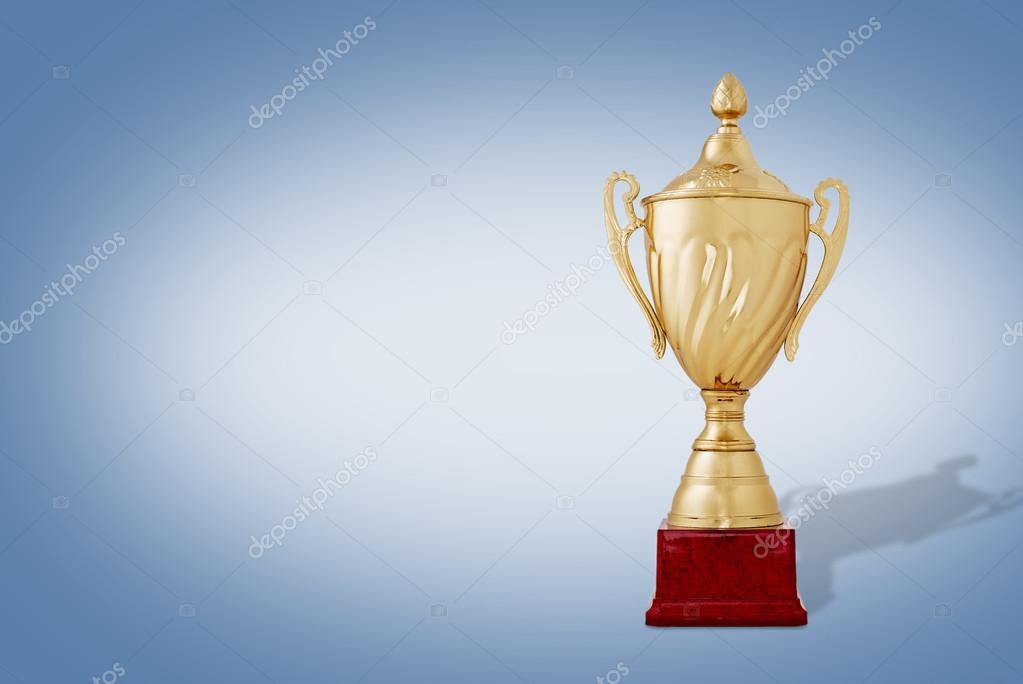 Gold trophy on a blue background Stock Photo by ©serggn 39033929