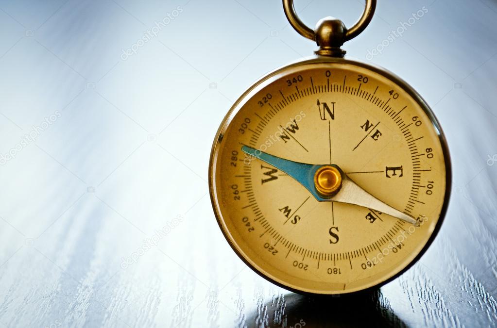 Magnetic handheld compass with copyspace — Stock Photo © serggn #49212871