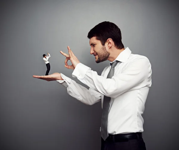 boss kicking out of the employer - Stock Image - Everypixel