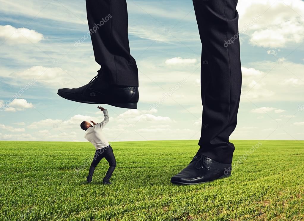 Boss trampling down his subordinate — Stock Photo © konstantynov #30006041