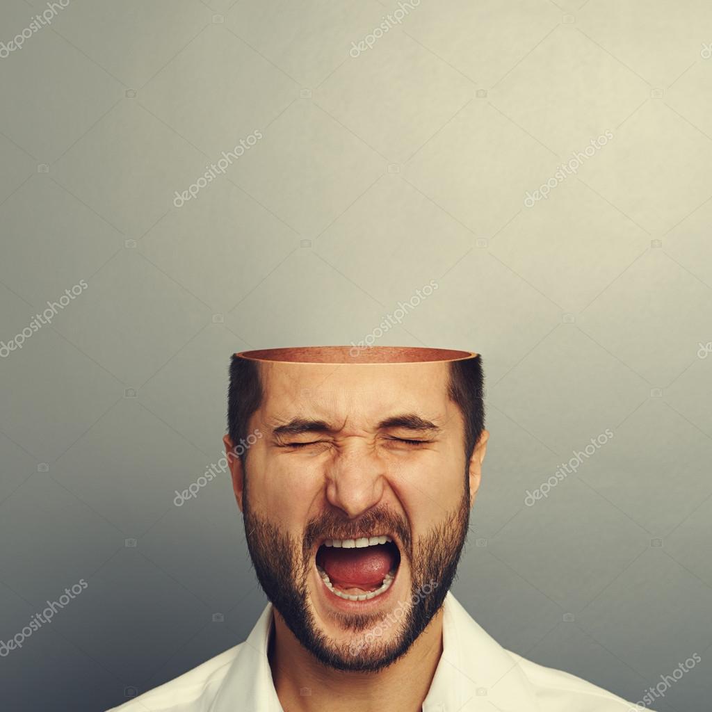 Screaming man with open head over grey Stock Photo by ©konstantynov ...