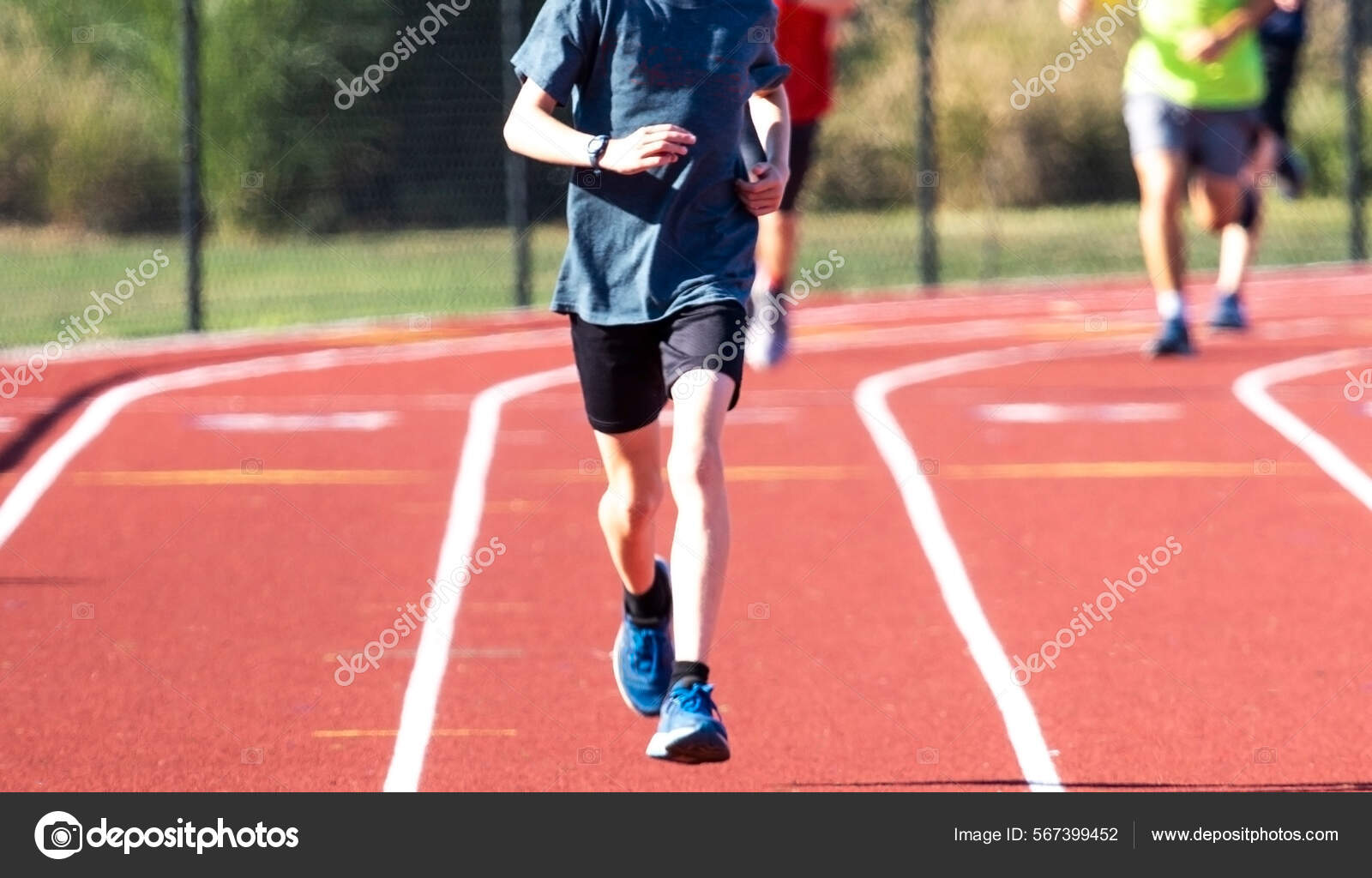 Front View Runners Running Track High School Track Field Practice ...