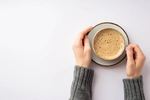 Autumn concept. First person top view photo of female hands in grey ...