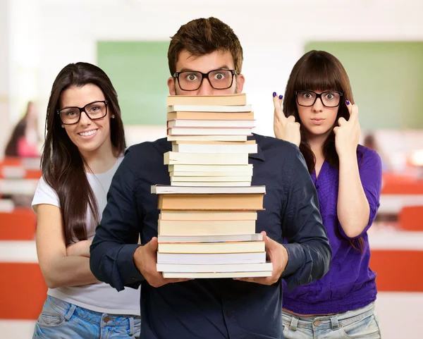 Student carrying books Images - Search Images on Everypixel