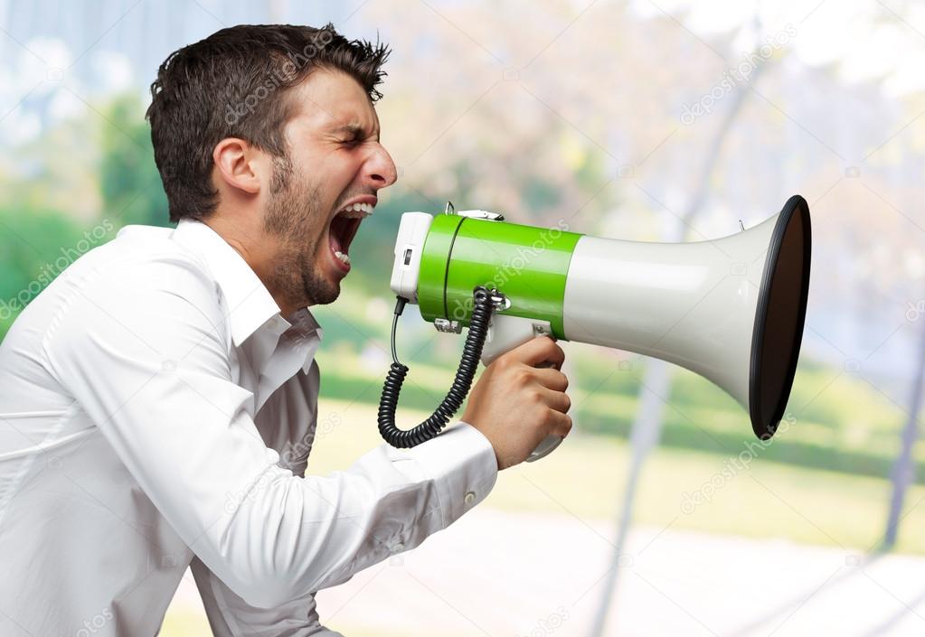 Man Yelling Through Megaphone