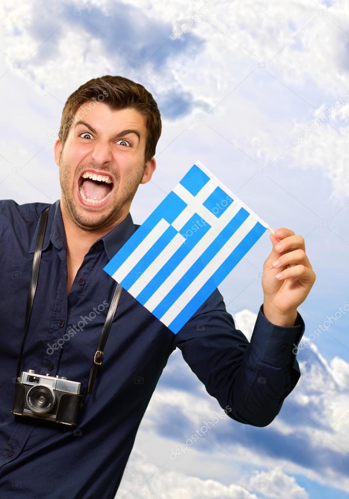 Man holding flag and miniature airplane Stock Photo by ©Krakenimages ...