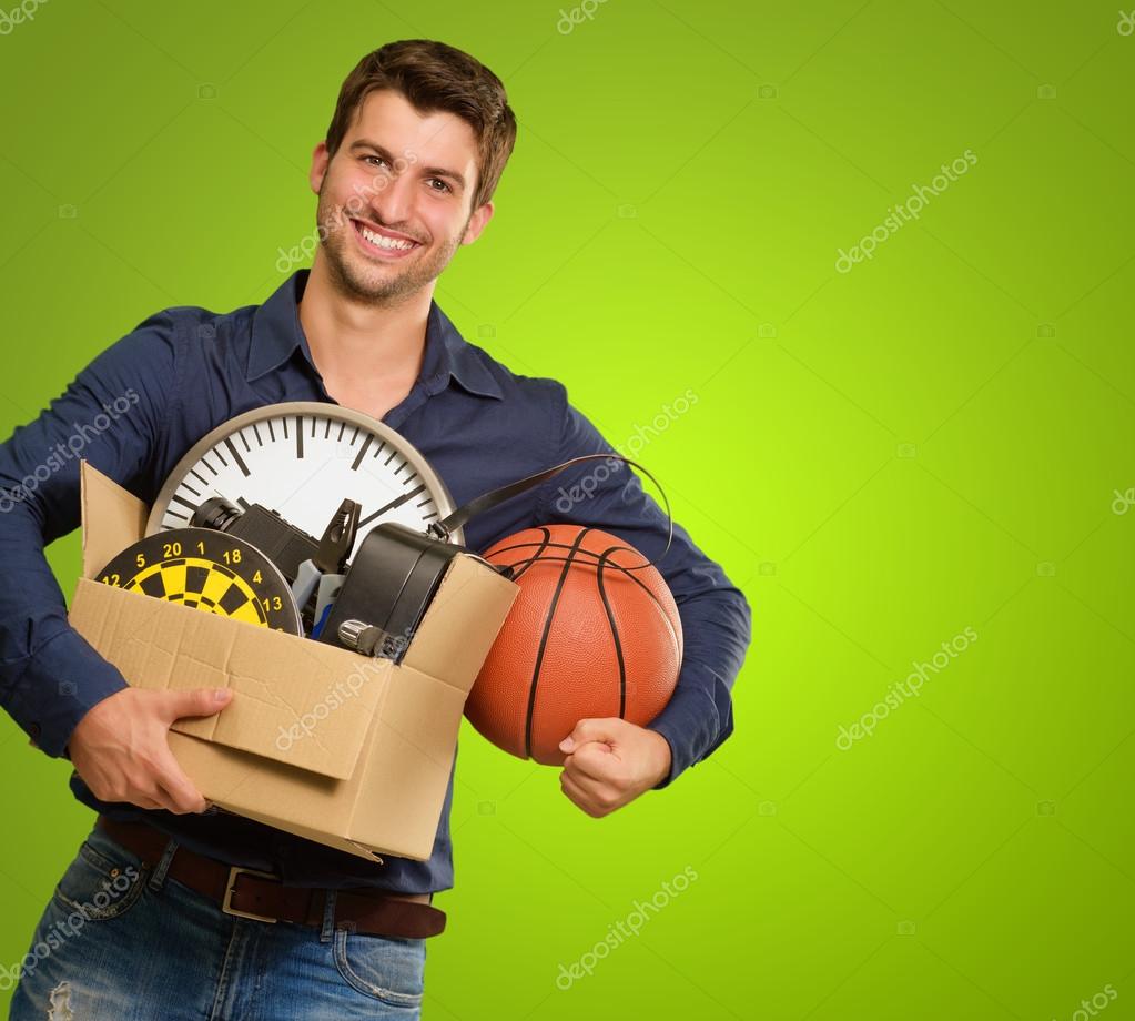 Man Holding Objects Stock Photo by ©Krakenimages.com 13361355