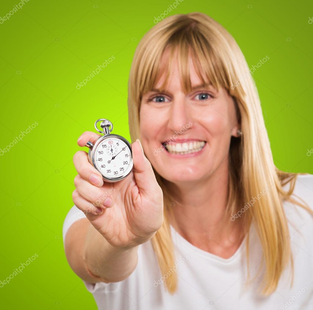 Woman Holding Stopwatch Stock Photo by ©Krakenimages.com 14424093