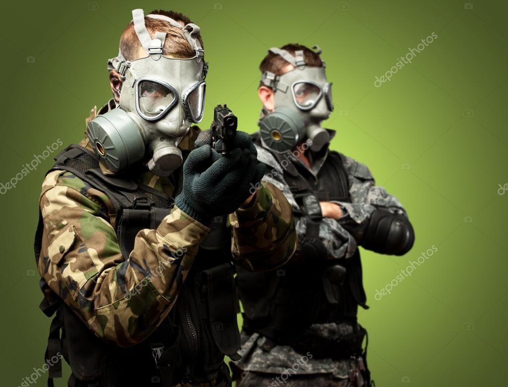 Portrait Of Soldiers With Gun And Gas Mask — Stock Photo © Krakenimages ...