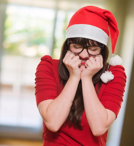 excited christmas woman with her eyes shut - Stock Image - Everypixel