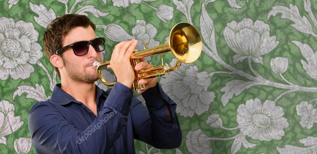 Young Man Holding Trumpet Stock Photo by ©Krakenimages.com 19519725