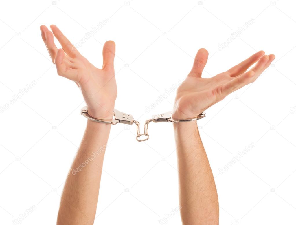 Close-up Hand Holding Handcuffs — Stock Photo © Aaron_Amat #23474926 Close-up Hand Holding Handcuffs — Stock Photo © Aaron_Amat #23474926